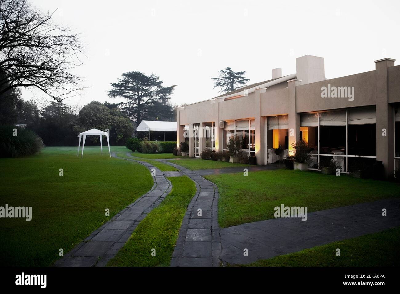 Walkway leading to a house Stock Photo - Alamy