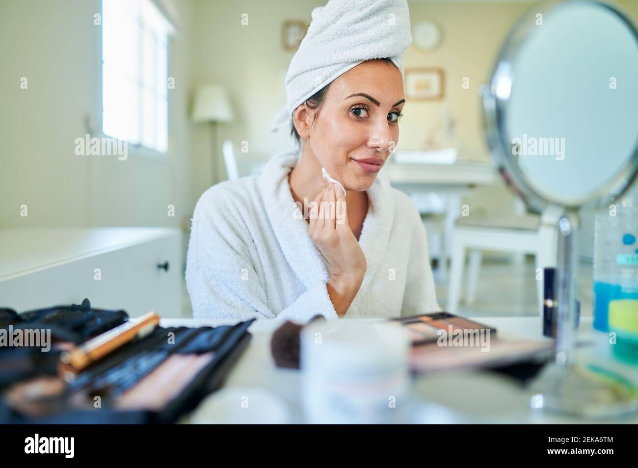 Woman removing her makeup hi-res stock photography and images - Alamy