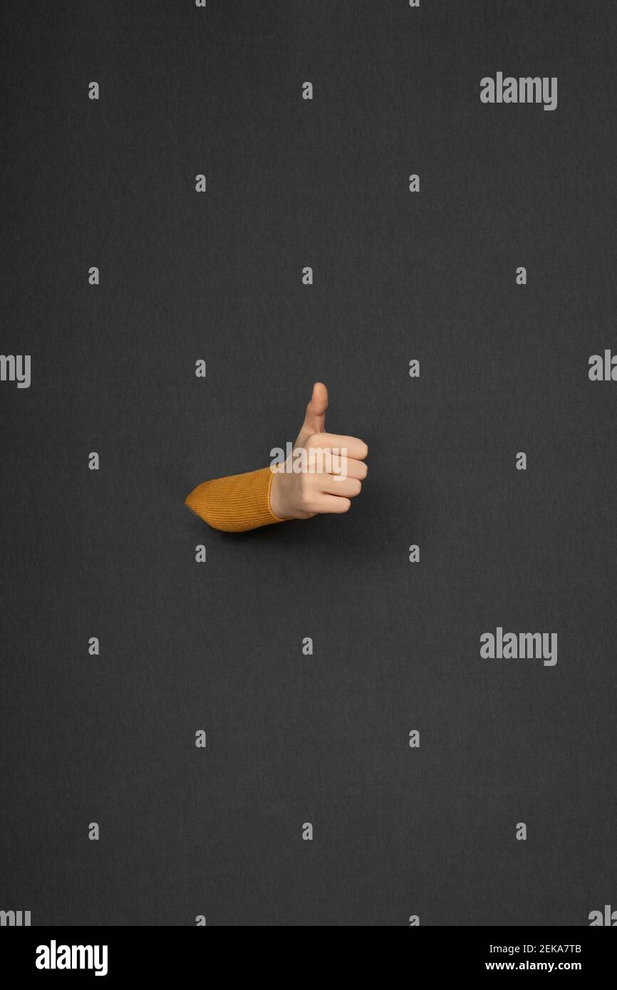 Person giving the thumbs up sign hi-res stock photography and images ...