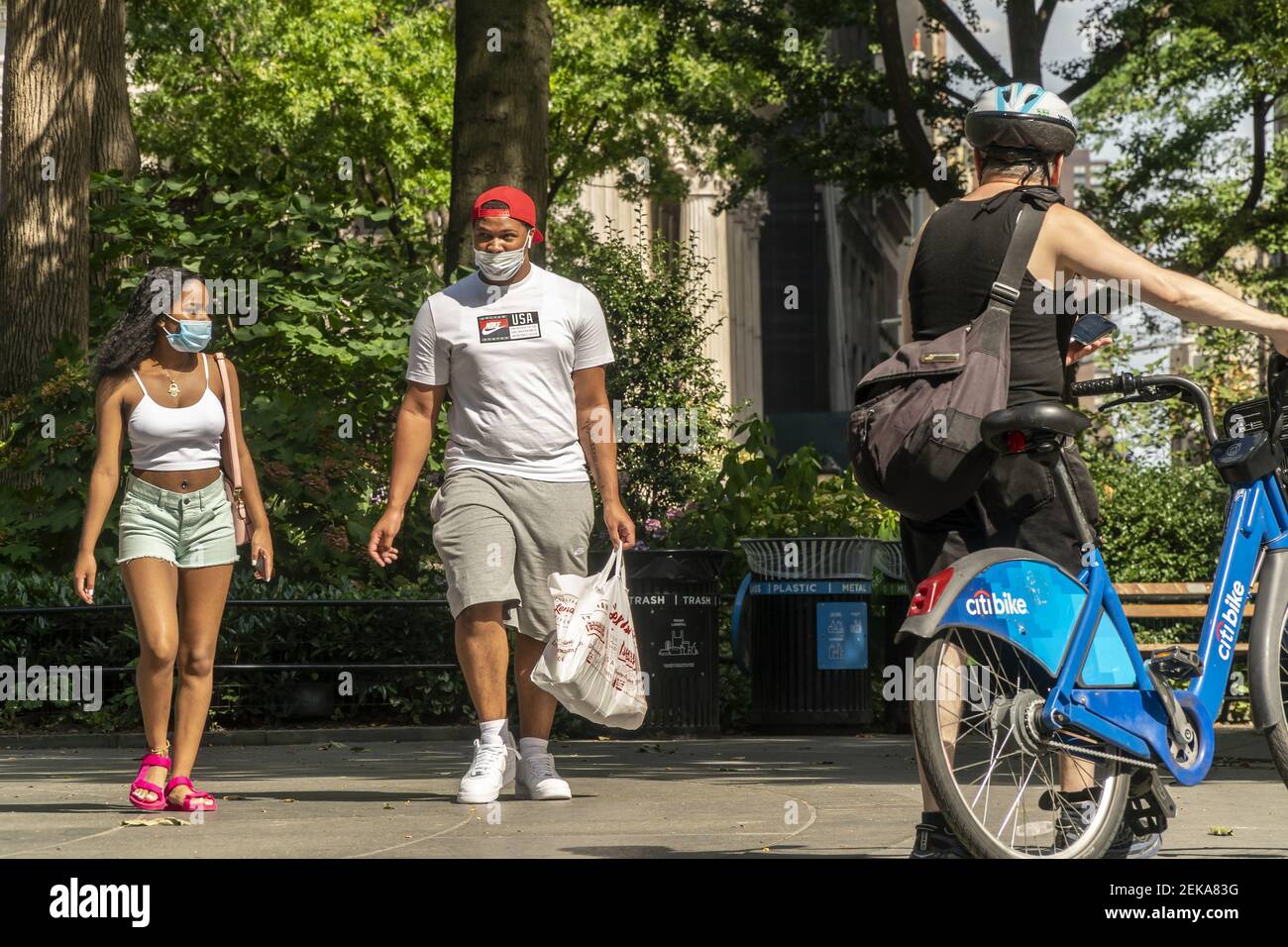 New Yorkers and visitors in Madison Square Park in New York on Monday ...