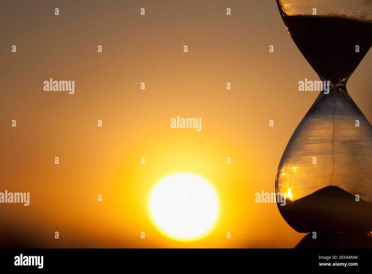Hourglass at sunset hi-res stock photography and images - Alamy