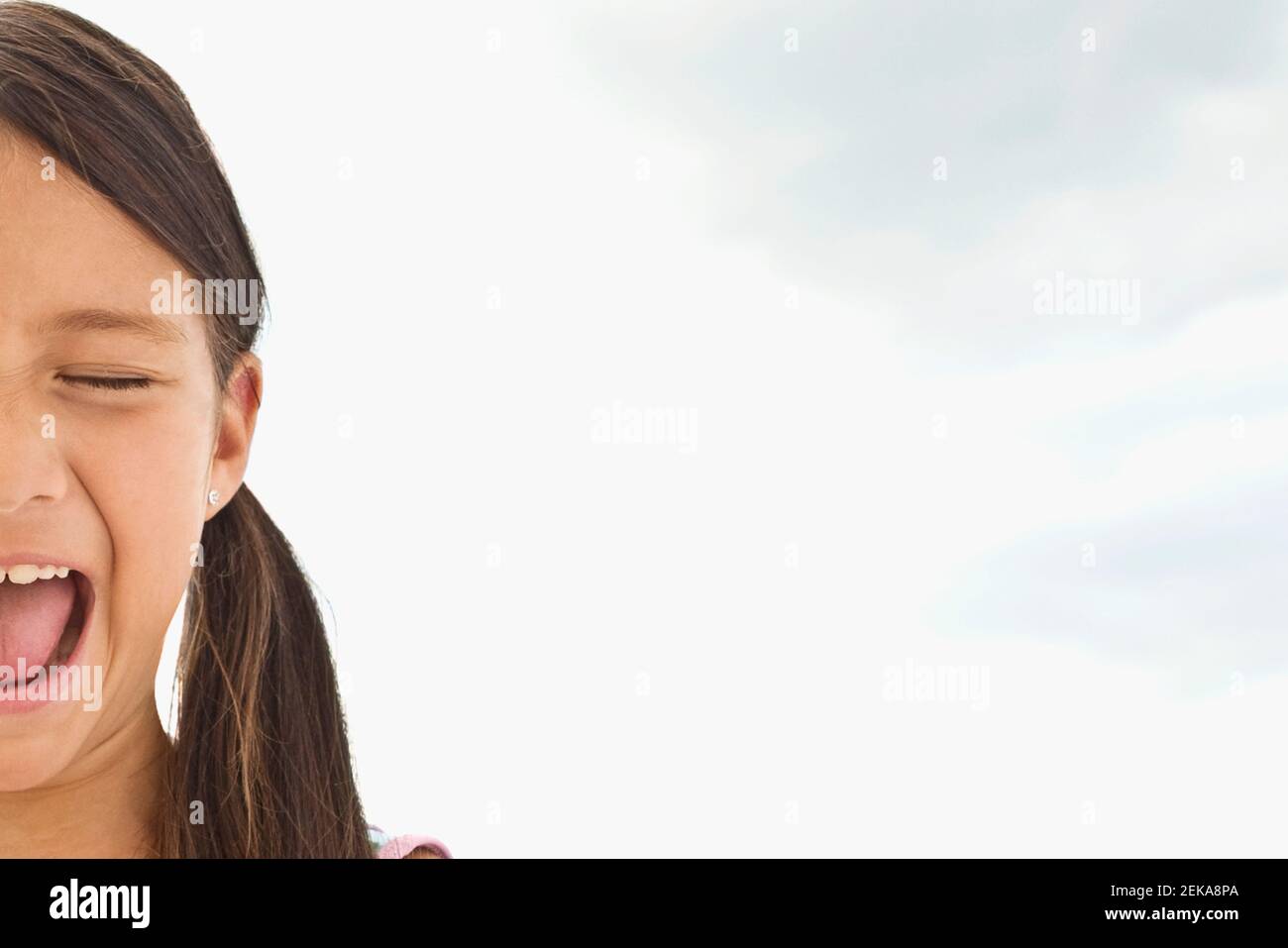Close up of a girl shouting Stock Photo - Alamy