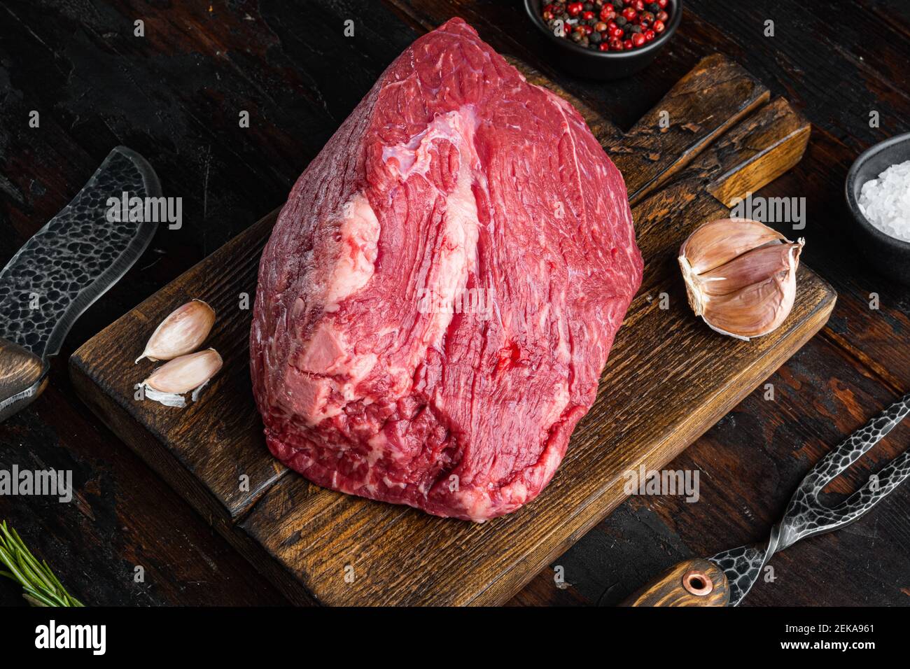 Marble beef raw set, on wooden cutting board, on old dark wooden table ...