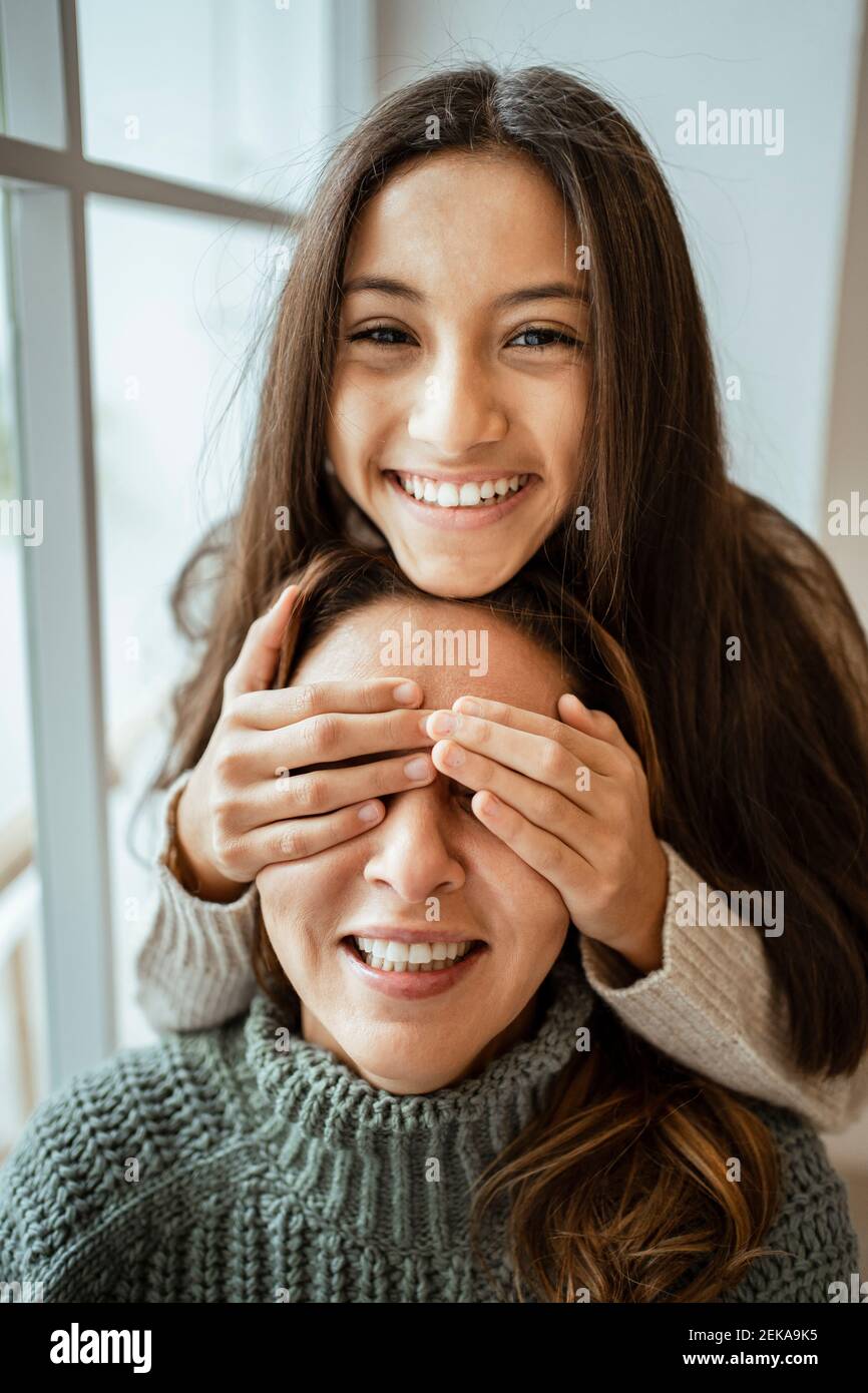 Mother covering child eyes hi-res stock photography and images - Alamy