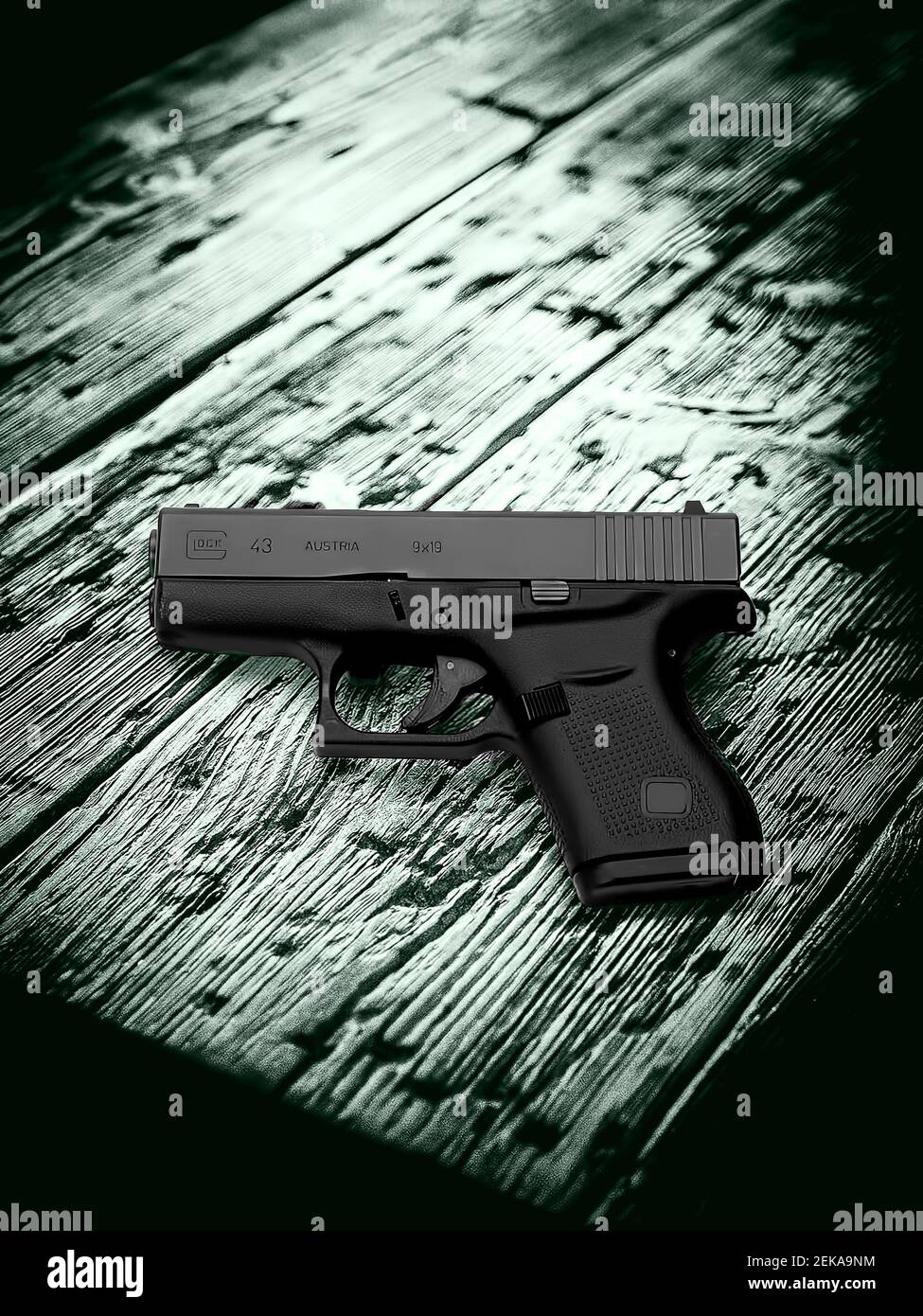 Gun on table hi-res stock photography and images - Alamy