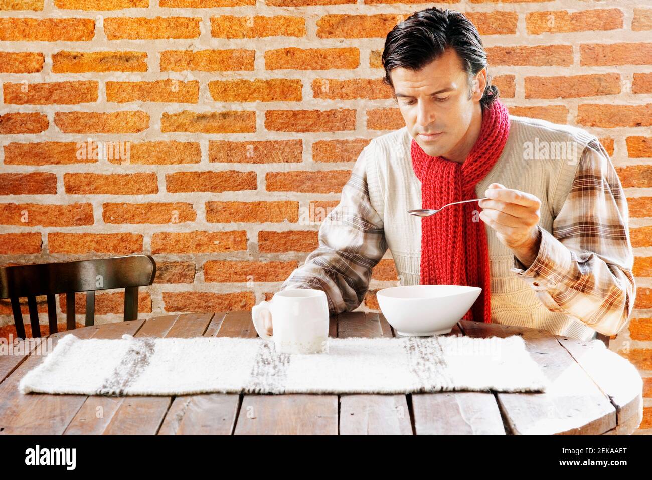 Man eating in a restaurant Stock Photo - Alamy