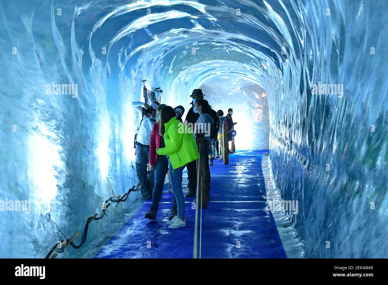 People visit the Chamonix Ice Cave is a cave excavated every year in ...