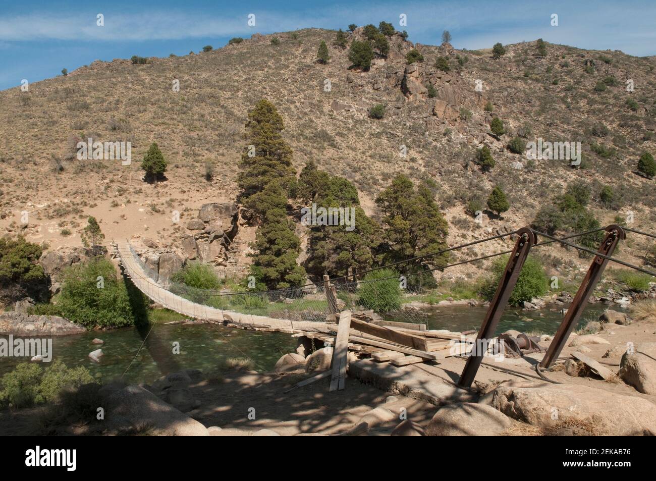 Suspension bridge over a stream, Cordillera de los Andes, Argentina ...