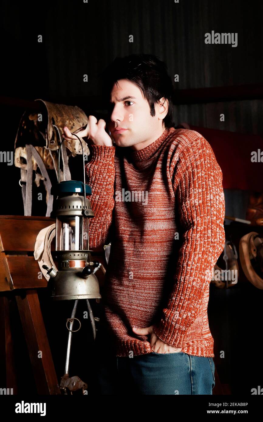 Man holding a lantern hi-res stock photography and images - Alamy