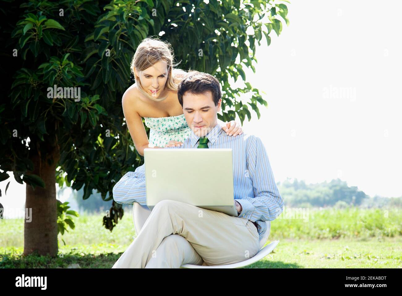 Female on computer from behind hi-res stock photography and images - Alamy