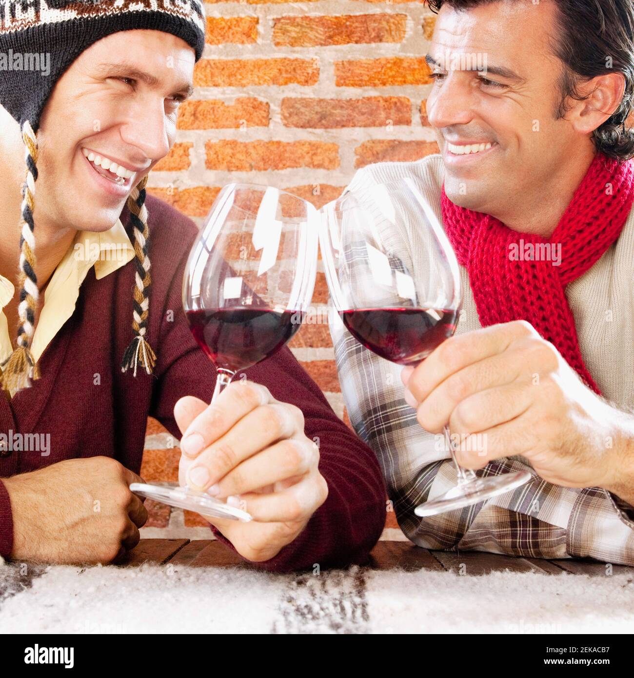 Two friends drinking wine in a restaurant Stock Photo - Alamy