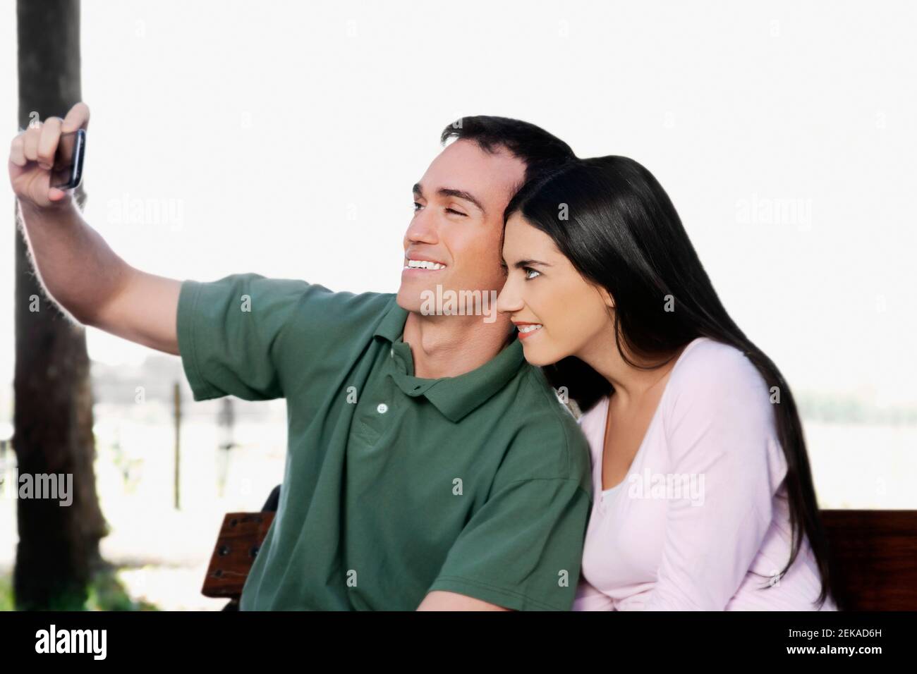 Couple taking a picture of themselves with a mobile phone Stock Photo ...