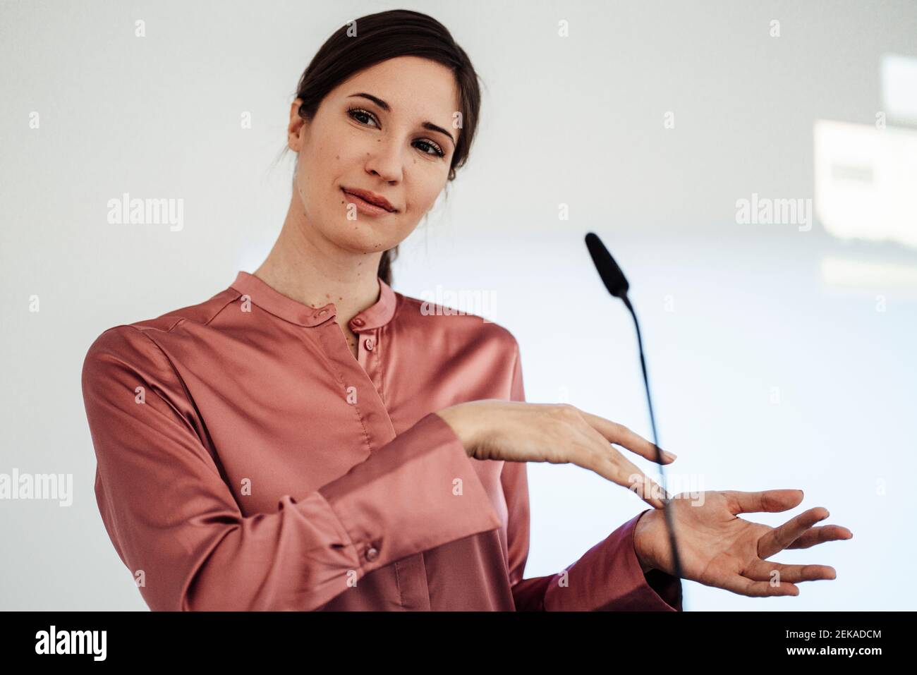 Beautiful woman giving presentation hi-res stock photography and images ...