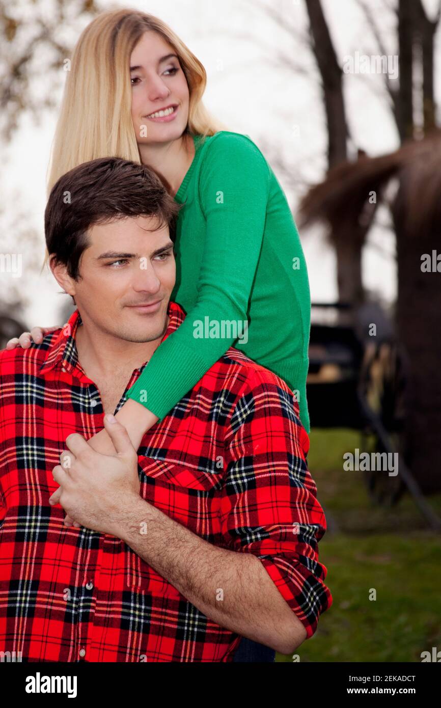 Woman riding piggyback on her boyfriend Stock Photo - Alamy Woman riding piggyback on her boyfriend Stock Photo - Alamy