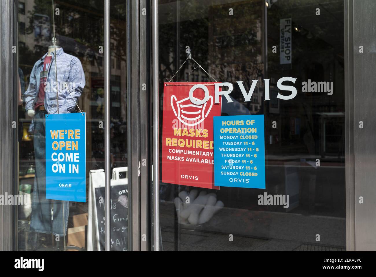 Many retail stores, bank branches and offices put posters on front ...