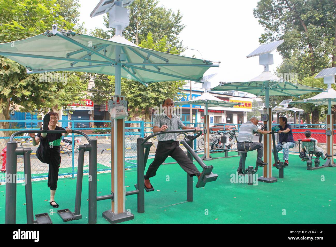 People use the intelligent workout equipment at Qingtan Community in ...