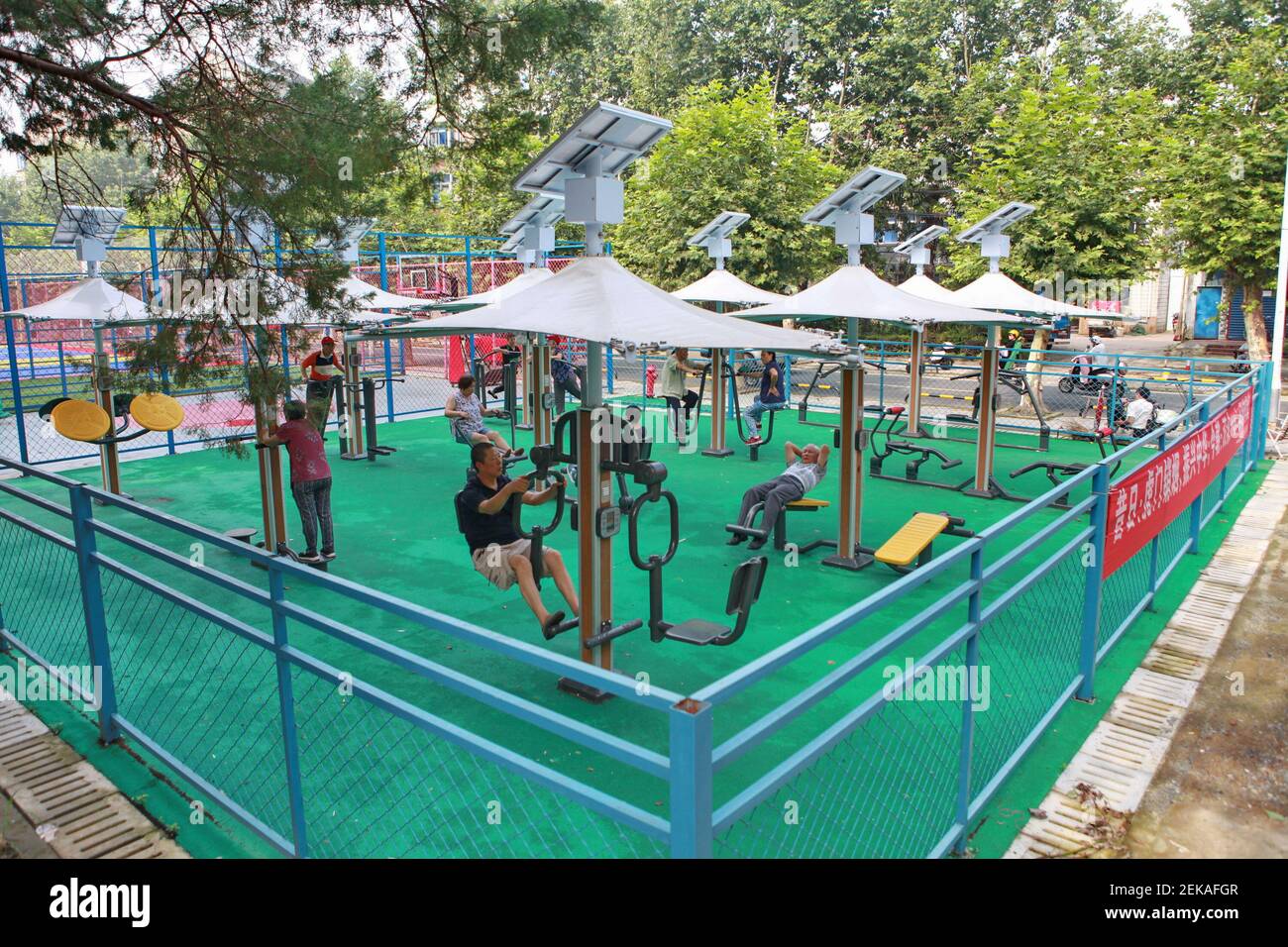 People use the intelligent workout equipment at Qingtan Community in ...