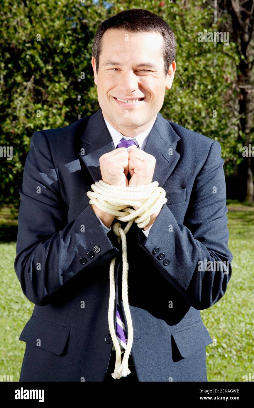 Co tied hands hi-res stock photography and images - Alamy