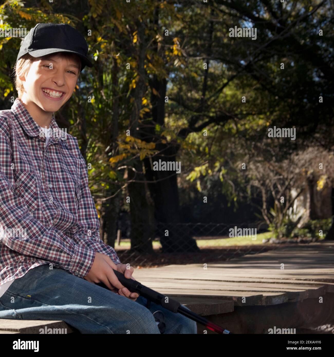 Boy fly fishing Stock Photo - Alamy