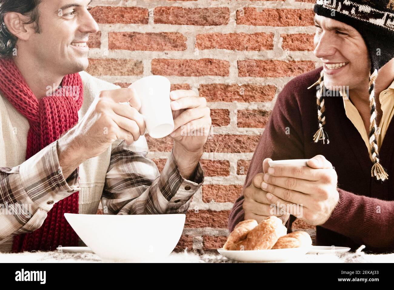 Two friends drinking coffee in a restaurant Stock Photo - Alamy