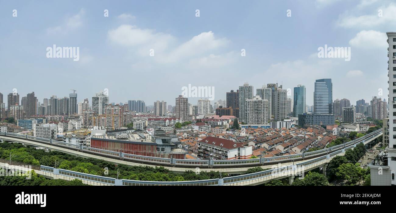 SHANGHAI, CHINA - JULY 22, 2020 - The light rail train passes on the ...