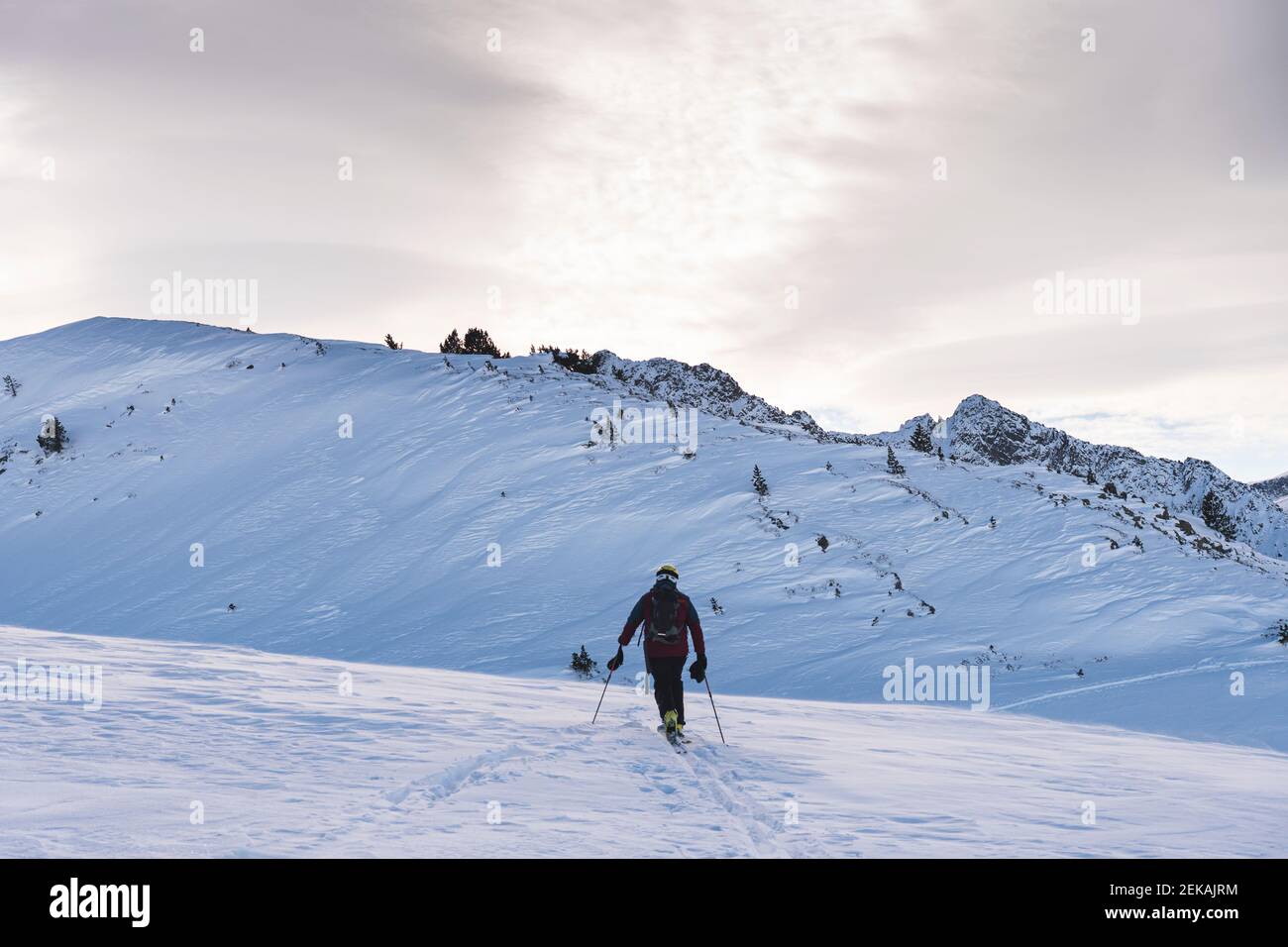 Skier climbing mountain hi-res stock photography and images - Alamy