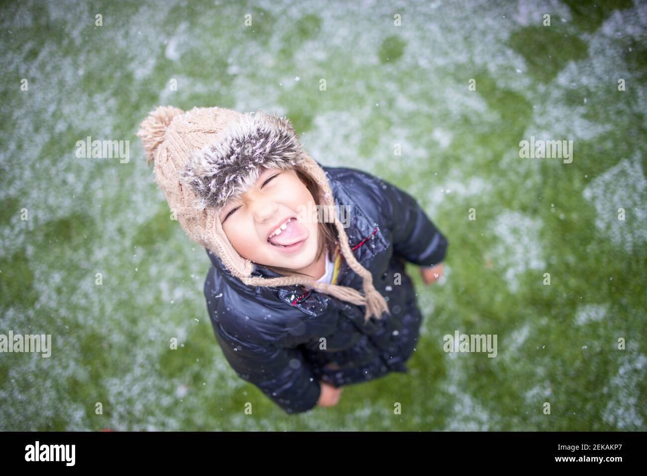 Child touching snow hi-res stock photography and images - Alamy