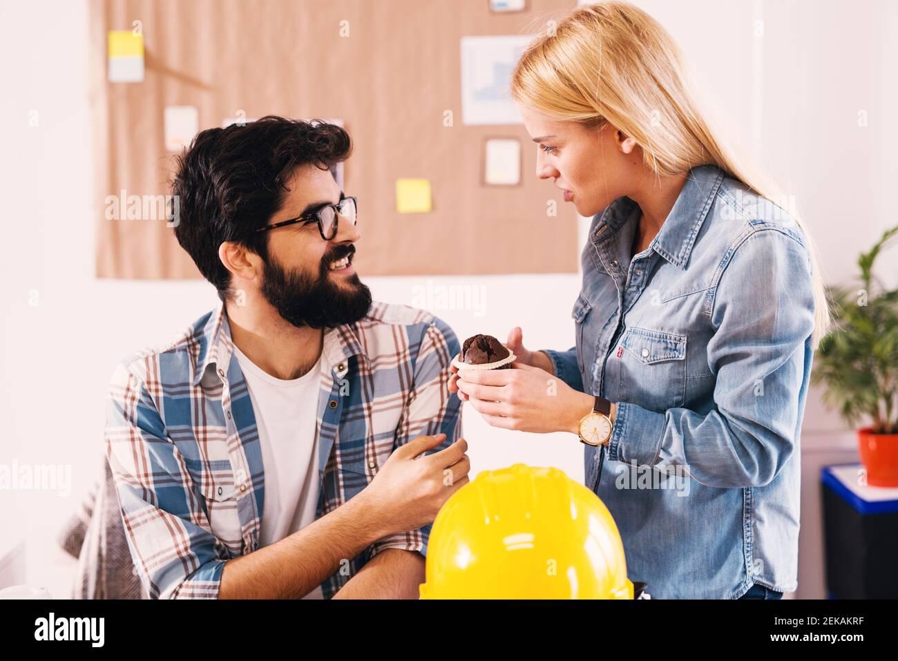 Happy handsome man being excited about his colleague bringing him a ...