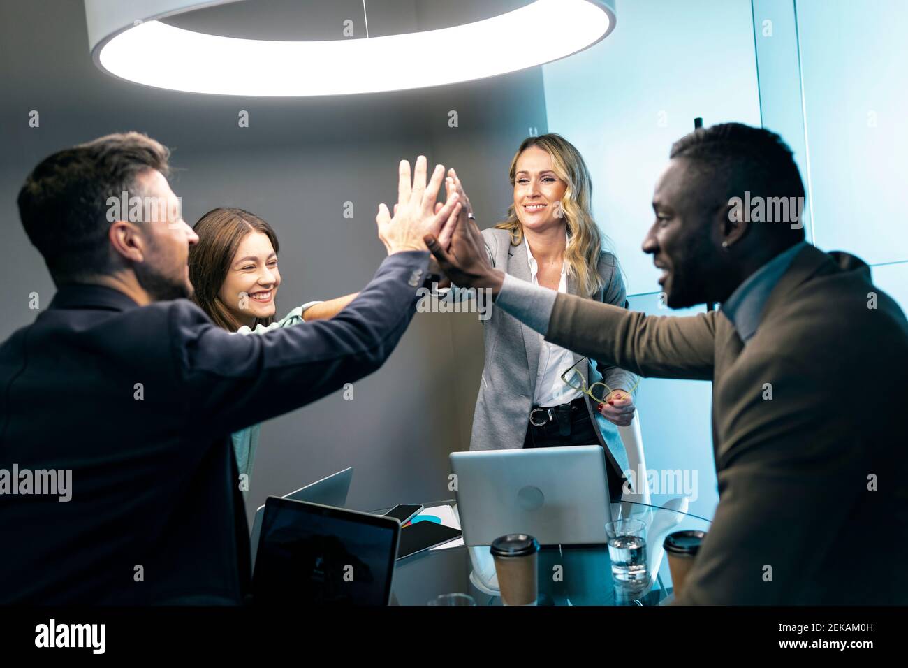 Group high five people hi-res stock photography and images - Alamy