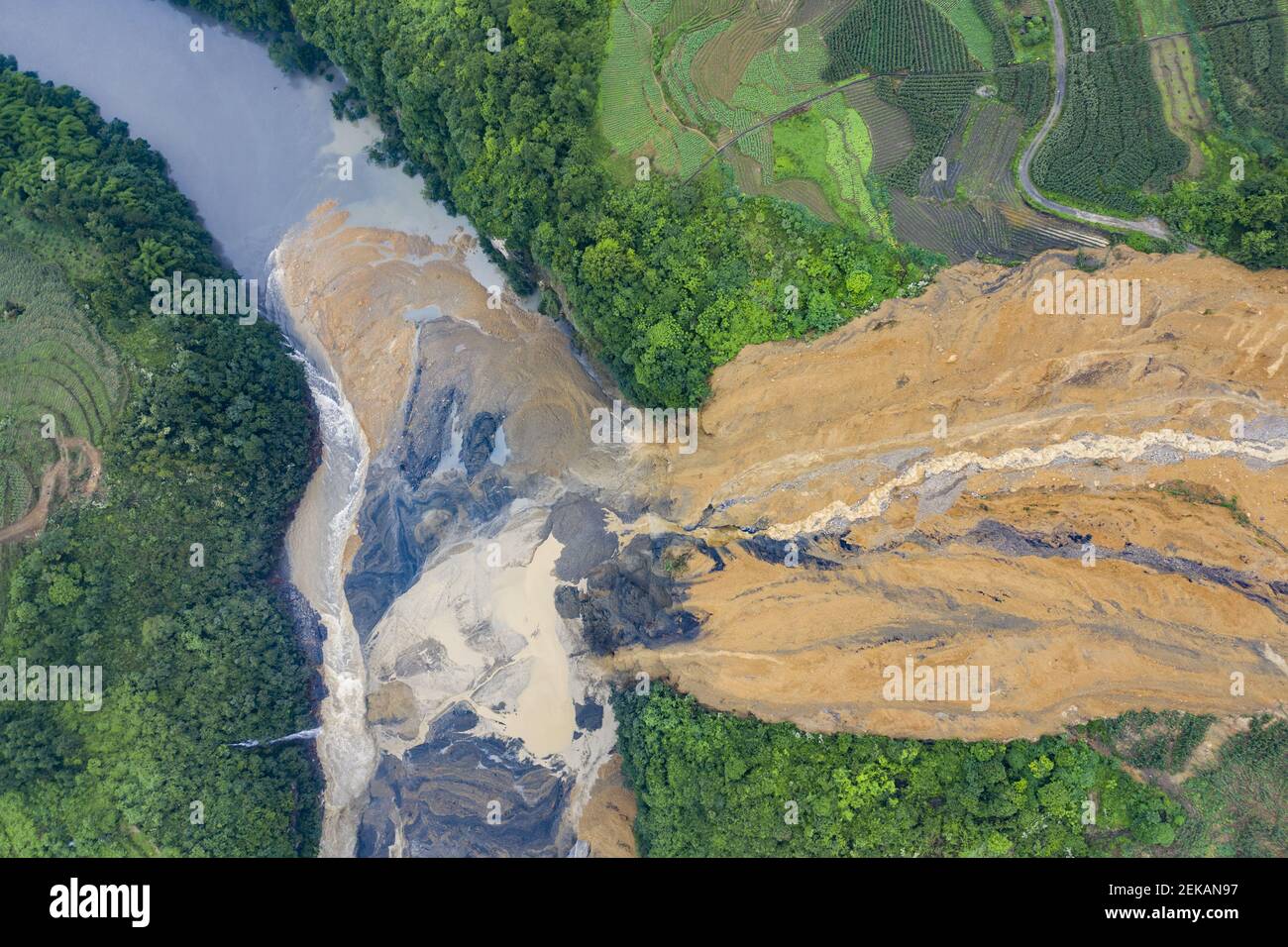 Aerial view of Qingjiang River turning into yellow due to landslide ...