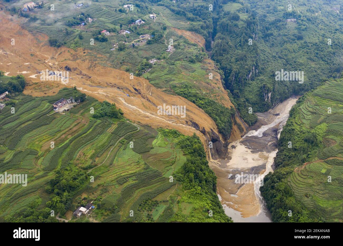 Aerial view of Qingjiang River turning into yellow due to landslide ...