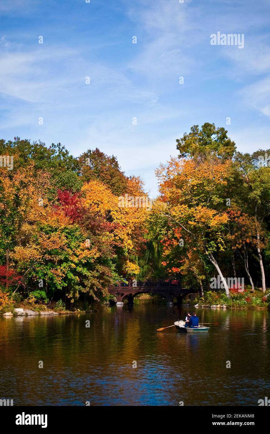 Tourists rowing a boat, Central Park, Manhattan, New York City, New ...