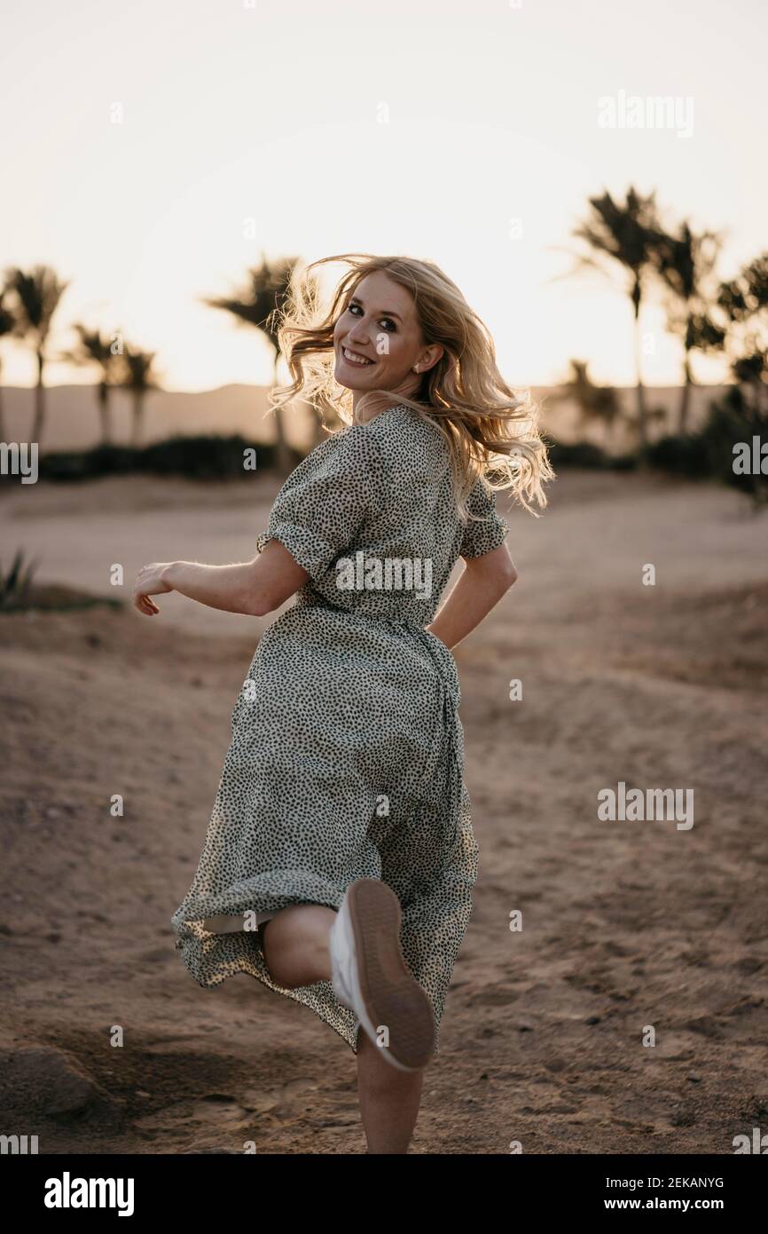 Woman dancing beach hi-res stock photography and images - Alamy