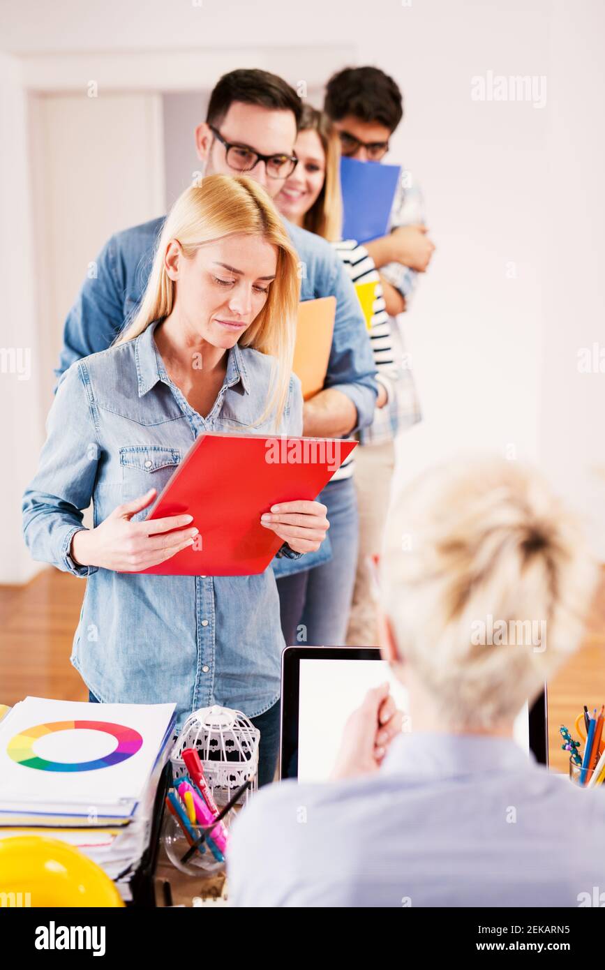 Man woman reading business reports hi-res stock photography and images ...