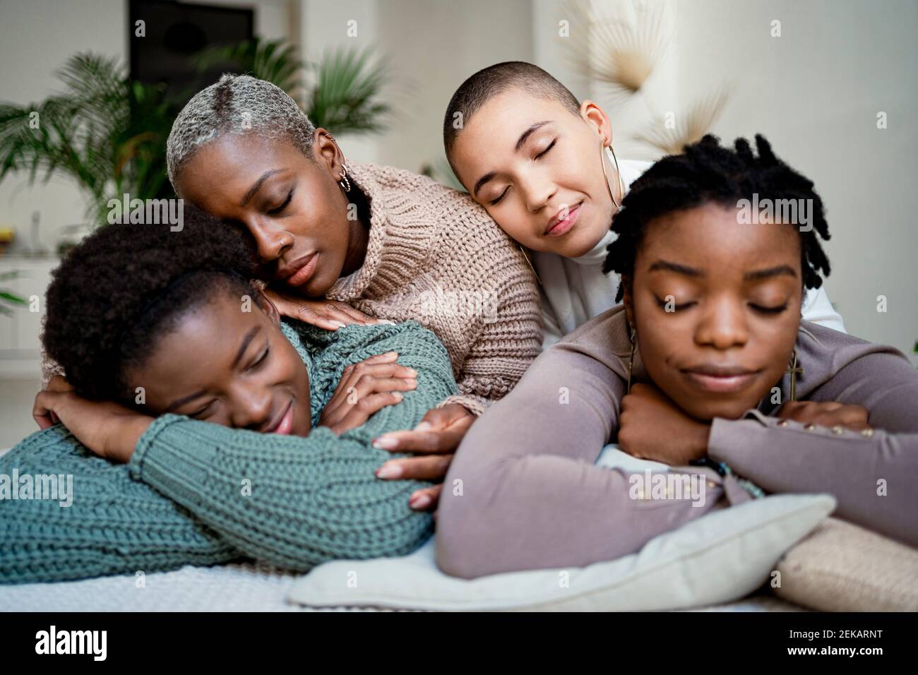 Female friends sleeping together at home Stock Photo - Alamy