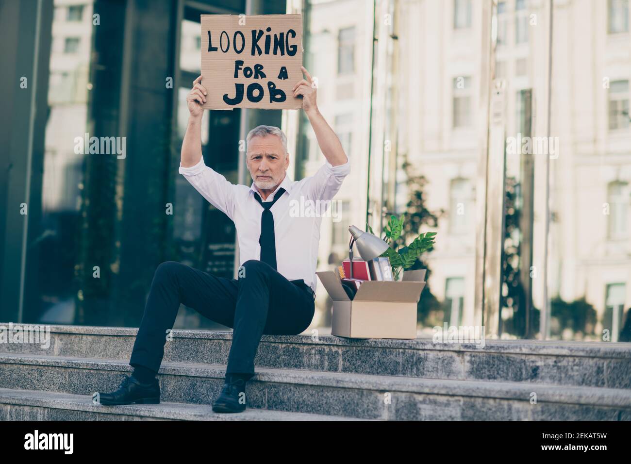 Photo of unhappy despaired age businessman wear white shirt lost work ...