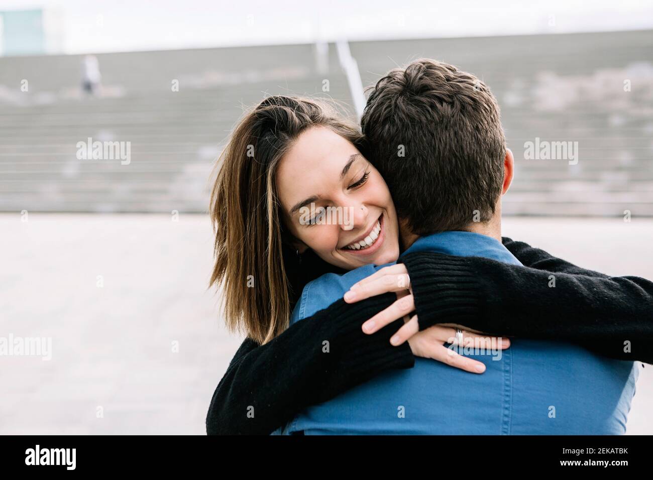 Young couple outdoors embracing hi-res stock photography and images - Alamy