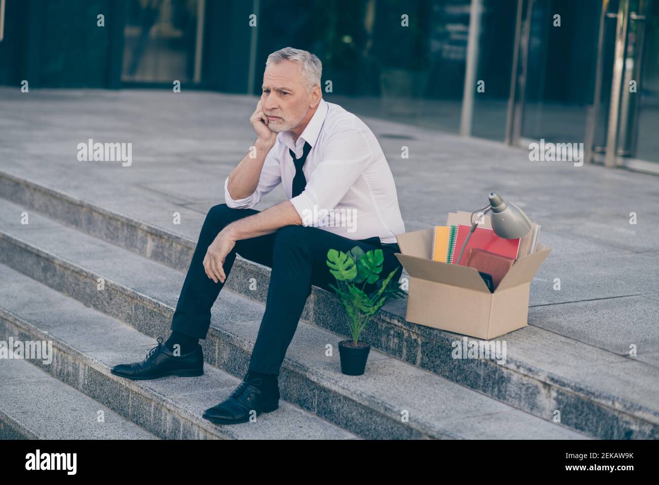 Full size photo of sad old business man sit got fired wear white shirt ...
