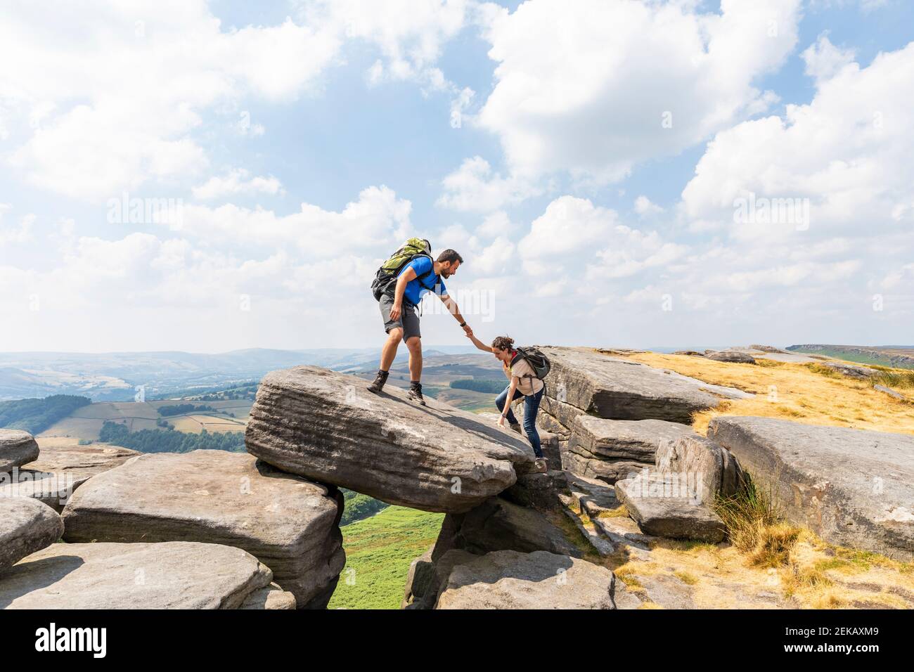 Helping hand mountain climbing hi-res stock photography and images - Alamy
