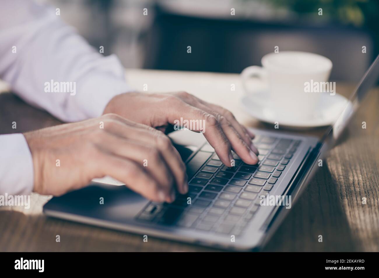 Cropped photo of hands type write laptop behind table businessman work ...