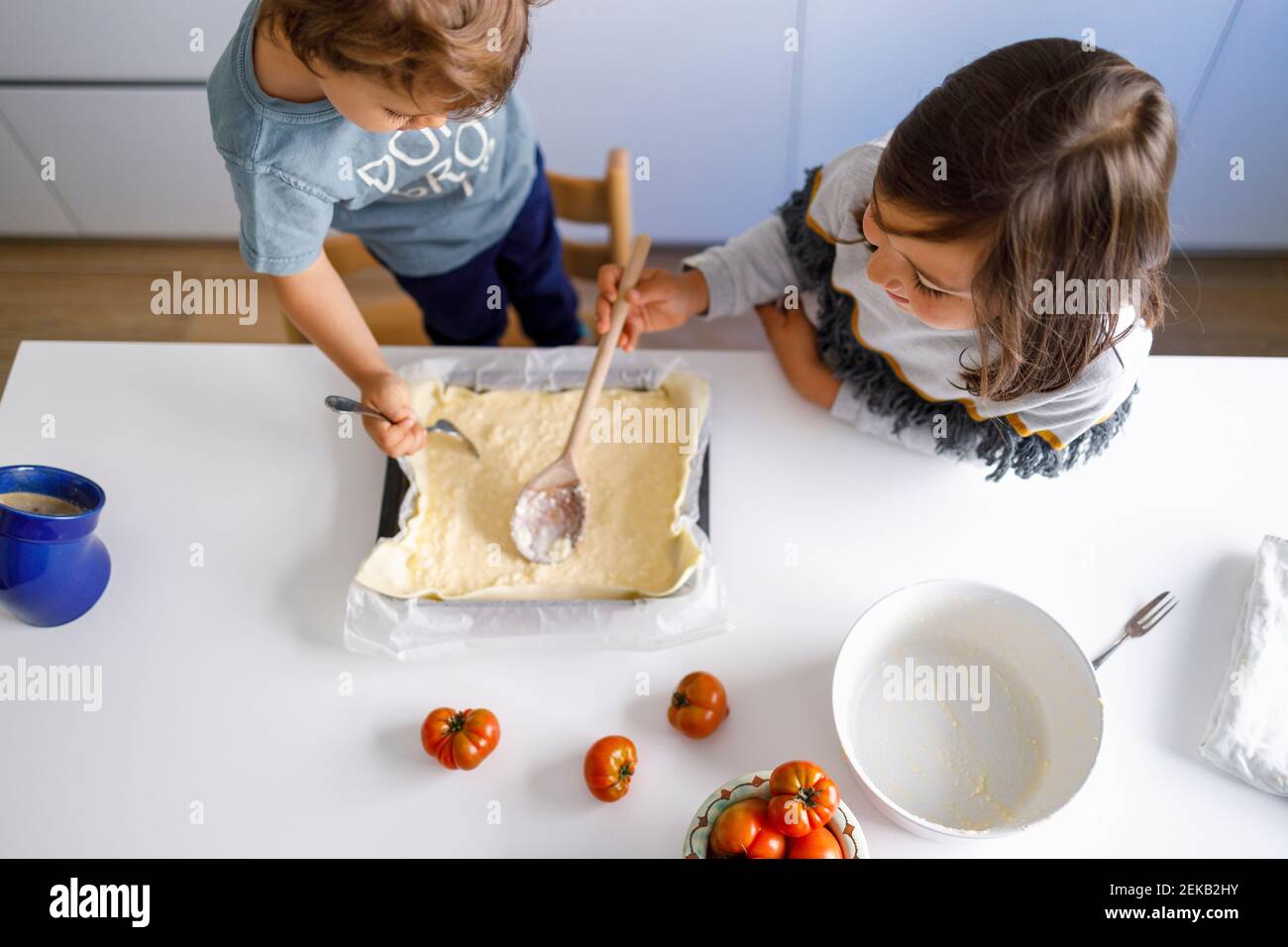 Cute boy cooking in kitchen at home Stock Photo - Alamy