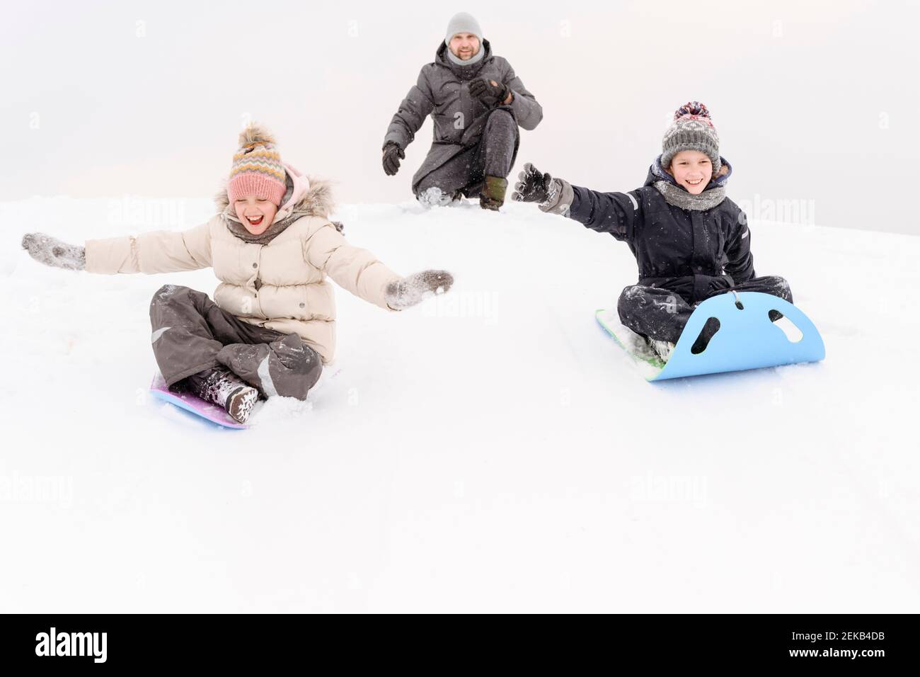Children sledding hill hi-res stock photography and images - Alamy
