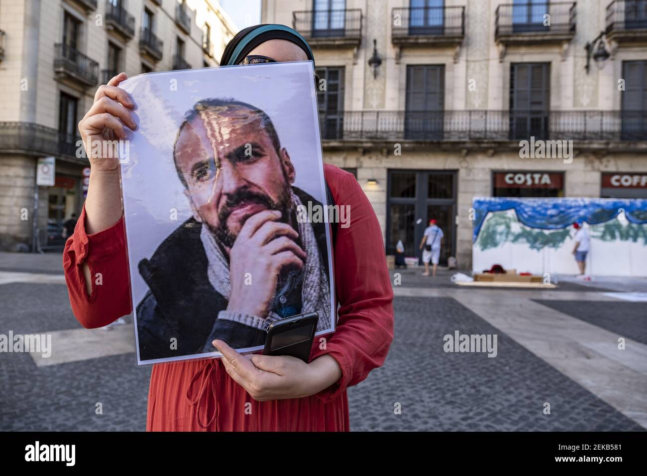 A supporter of the Popular Rif Movement (Hirak) is seen showing a ...