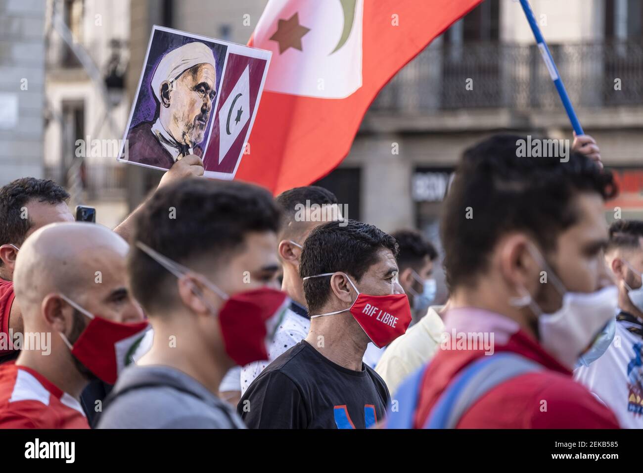 Supporters of the Popular Rif Movement (Hirak) are seen wearing masks ...