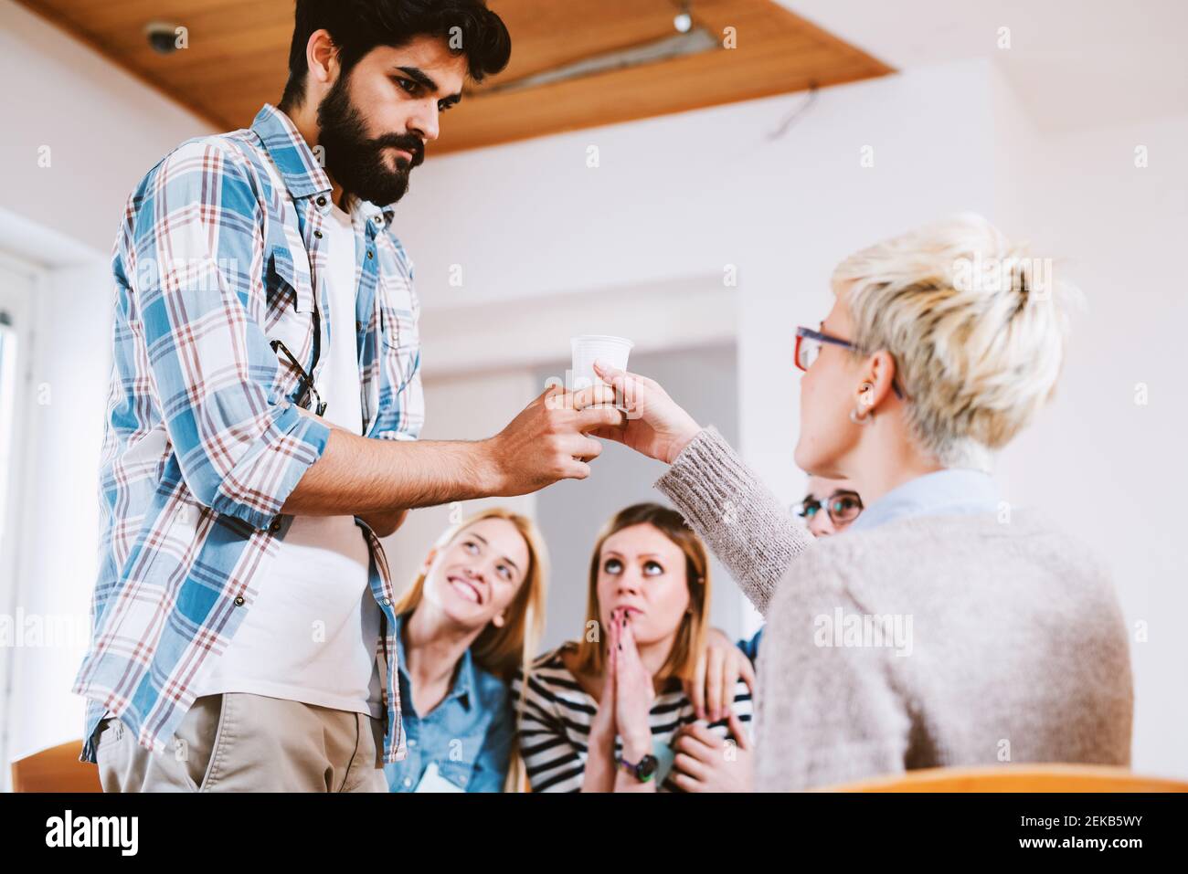 Picture of a emotionally broken man in a therapy group Stock Photo - Alamy