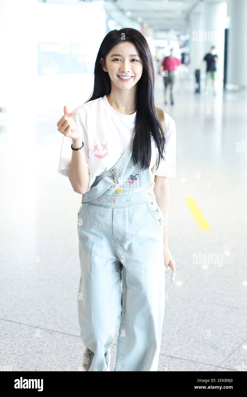 Malaysian singer and actress Joey Chua arrives at a Beijing airport ...