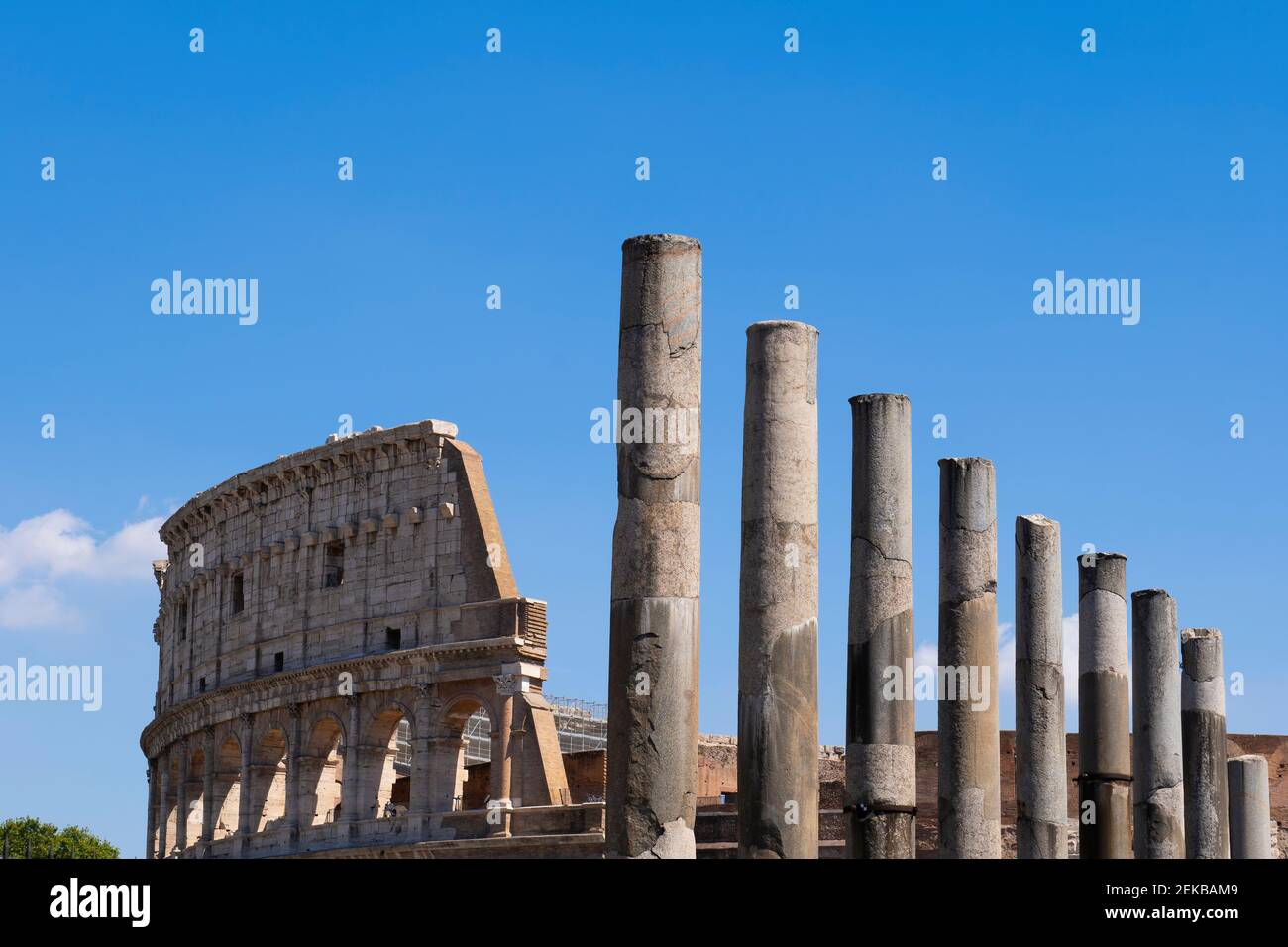 Italy, Rome, Colosseum, Via Sacra, Columns and ancient amphitheatre ...