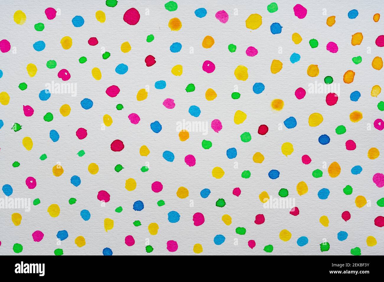 Colorful watercolor abstract dots pattern on white paper background ...