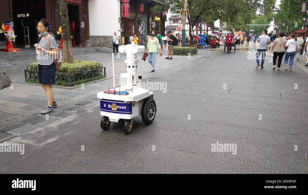An unmanned patrol robot is patrolling on the street of the Confucius ...