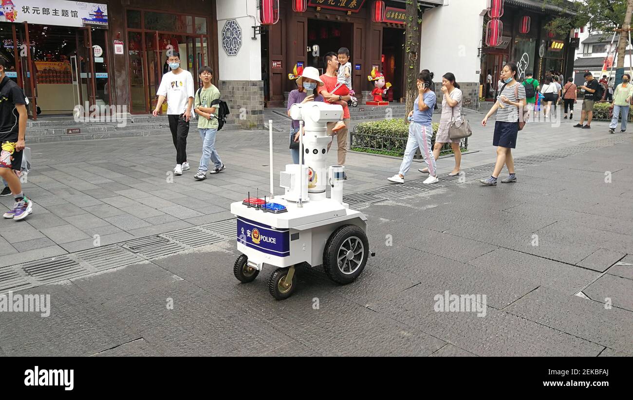 An unmanned patrol robot is patrolling on the street of the Confucius ...